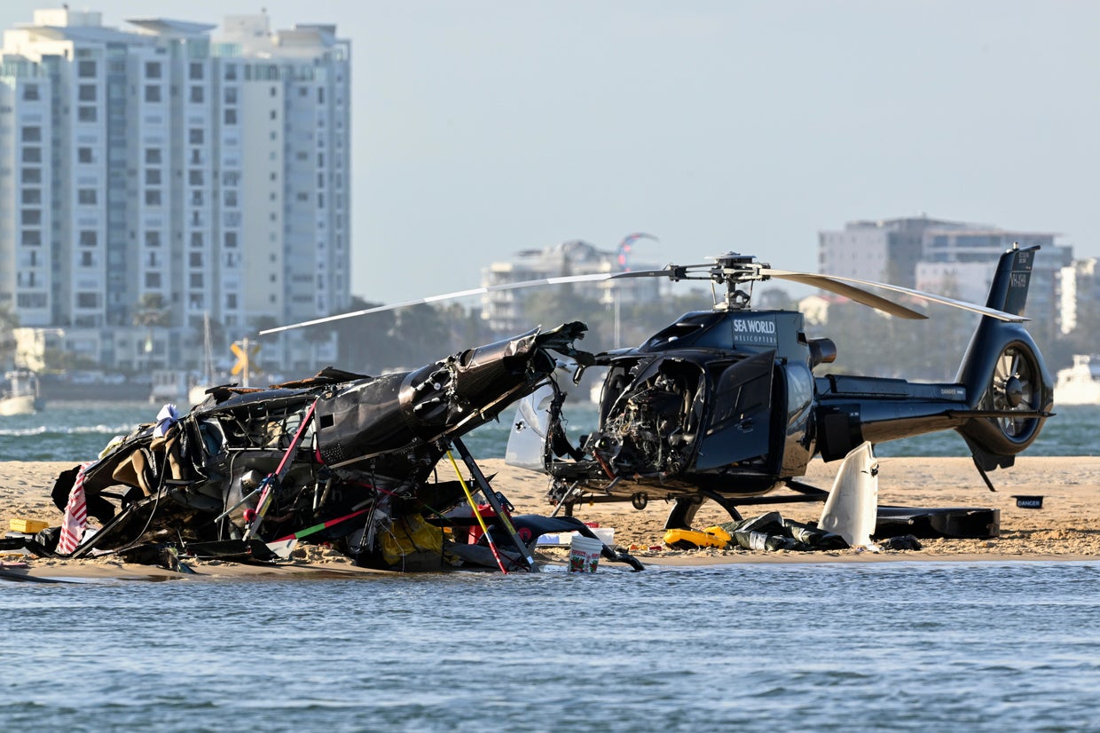 Helicopters collide over Australian tourist hotspot, killing 4 - CBS News