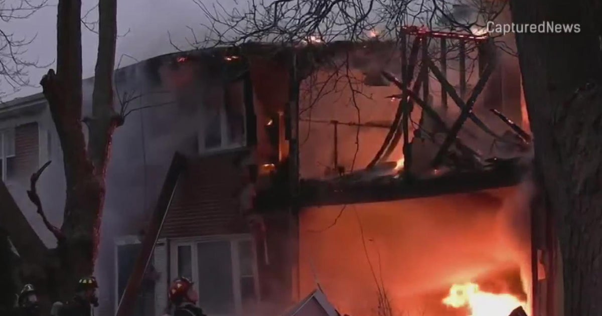 Neighbors hear blast before fire rips through Maine Township townhomes ...