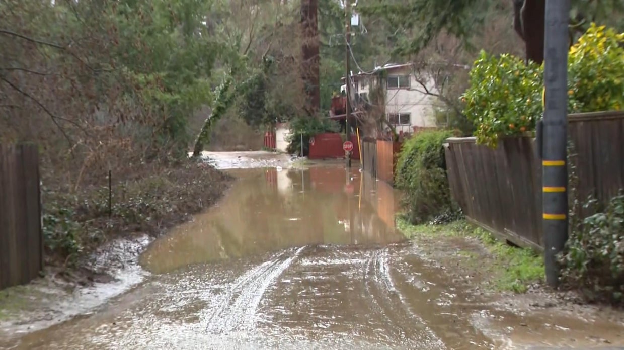 Photos: Overnight atmospheric river triggers widespread flooding across ...