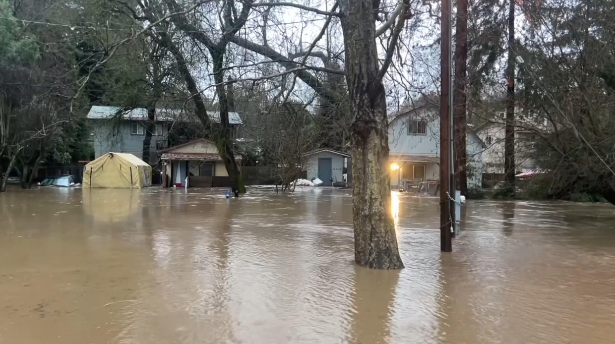 Photos: Overnight atmospheric river triggers widespread flooding across ...