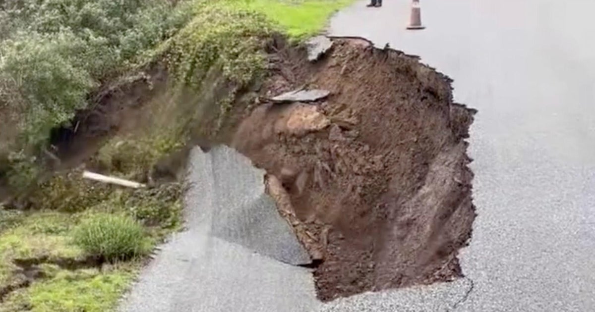 Road collapses following intense storms in California - CBS News