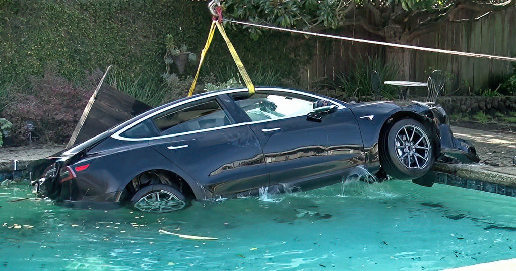 Tesla driver dies after car plunges into North Bay swimming pool - CBS ...