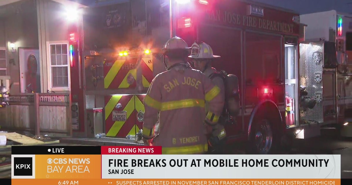 Firefighters battle early morning blaze at mobile home community - CBS ...