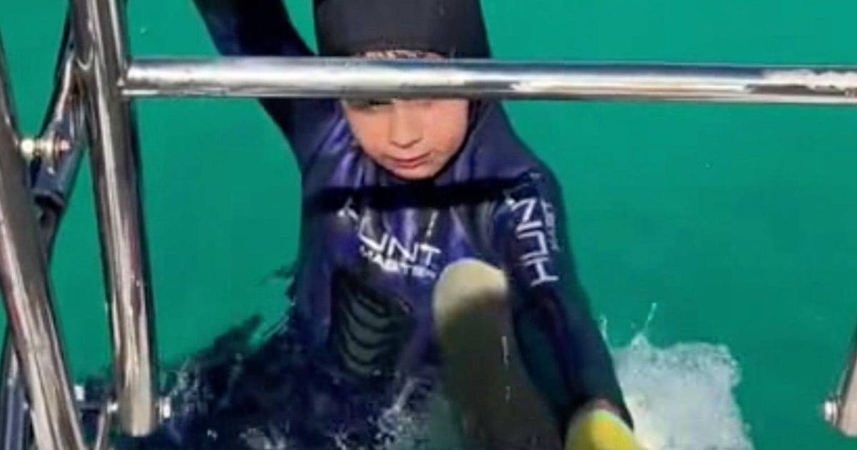 Video shows shark biting 8-year-old boy during family fishing trip ...