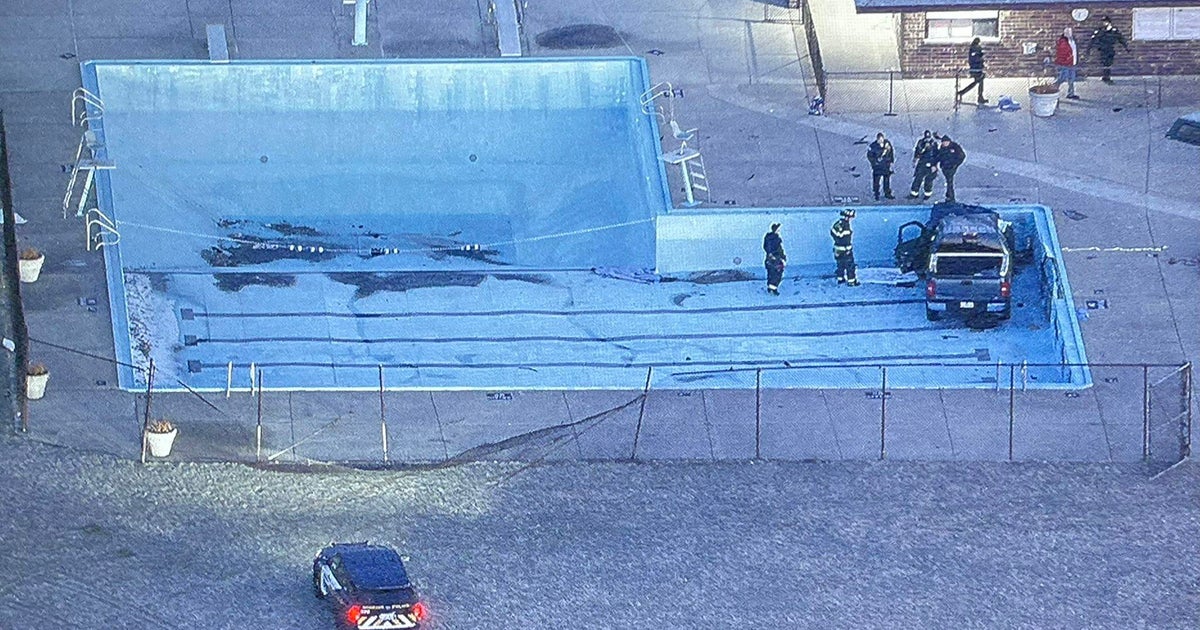 Man returning from hospital crashes into pool - CBS Chicago