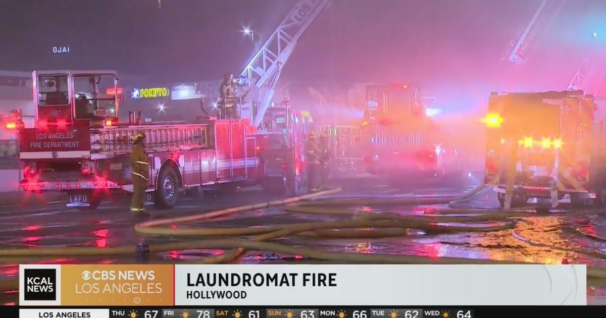 Firefighters extinguish huge strip mall fire in Hollywood - CBS Los Angeles