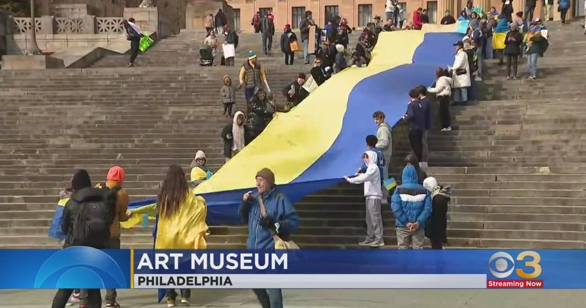 Philly's Ukrainian community displays nation's flag on Art Museum steps - CBS Philadelphia