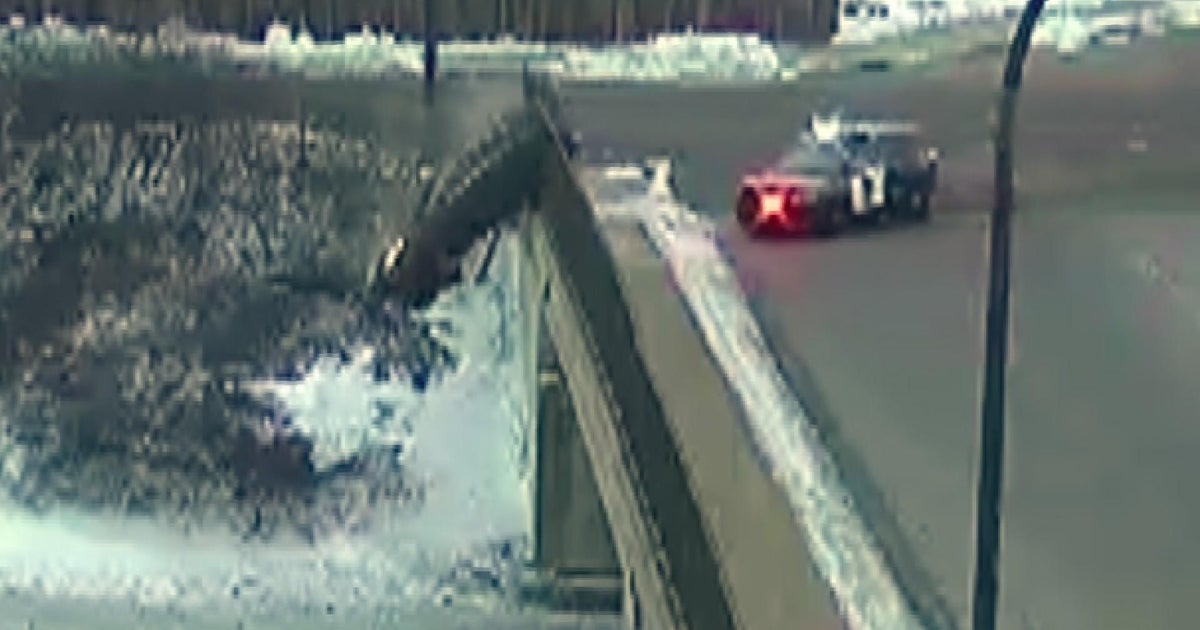 Car flips over bridge following police pursuit - CBS Minnesota