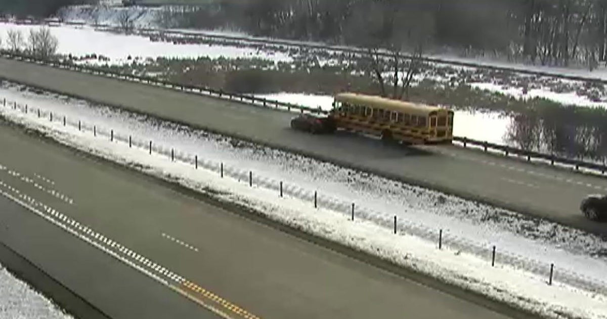 Video: Car spins out on metro highway, then struck by school bus - CBS ...