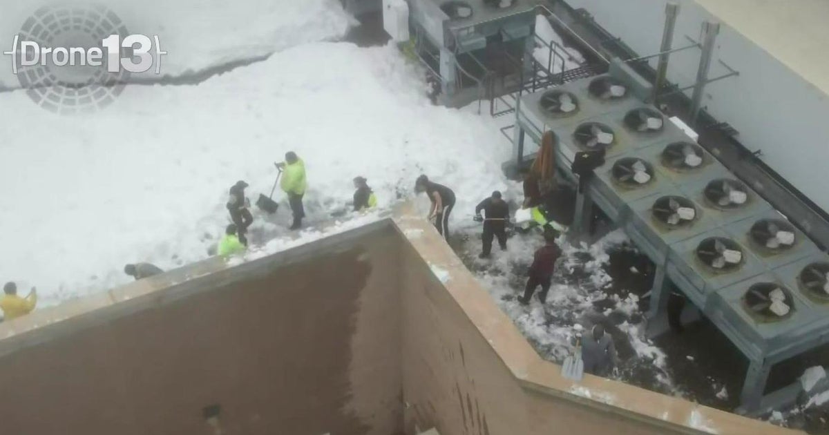 Workers clear snow from Pollock Pines Safeway to prevent further leaks ...