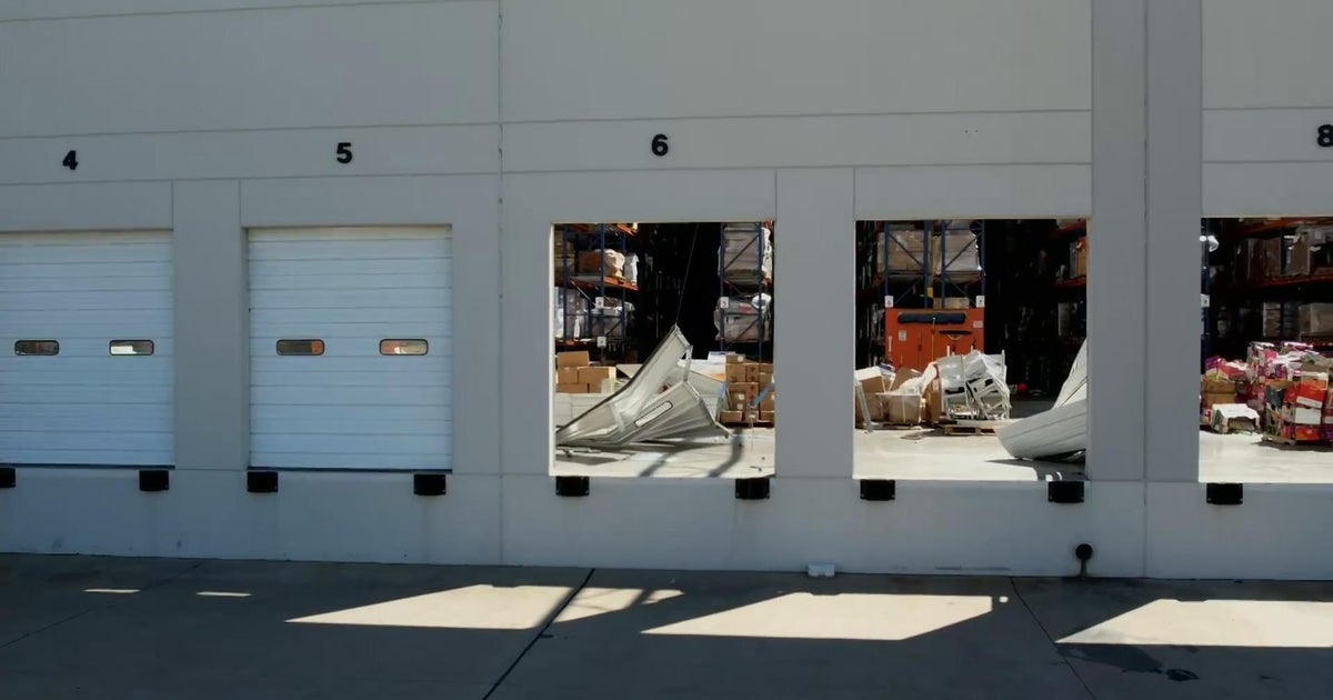 Drone captures video of warehouse damaged in Texas storms - CBS Texas