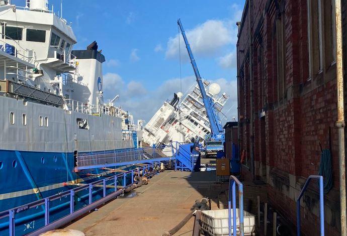 Ship in Scotland tips over in dry dock, injuring more than two dozen ...