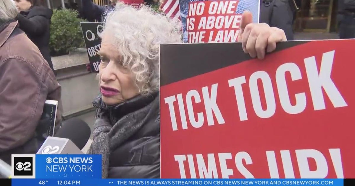 Small group protests outside Trump Tower in support of indictment - CBS ...
