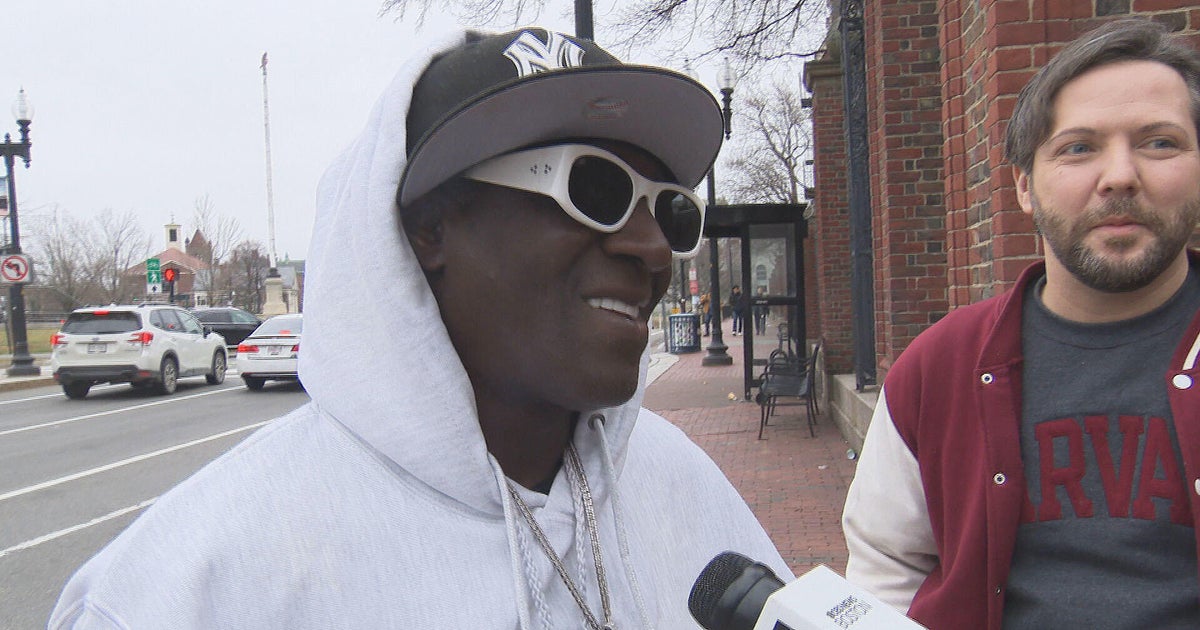 Rapper Flavor Flav visits Harvard University, volunteers at homeless ...