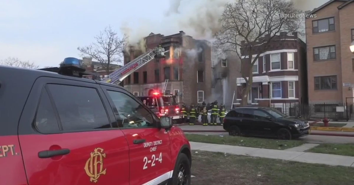 Woman hospitalized after apartment fire on West Side - CBS Chicago