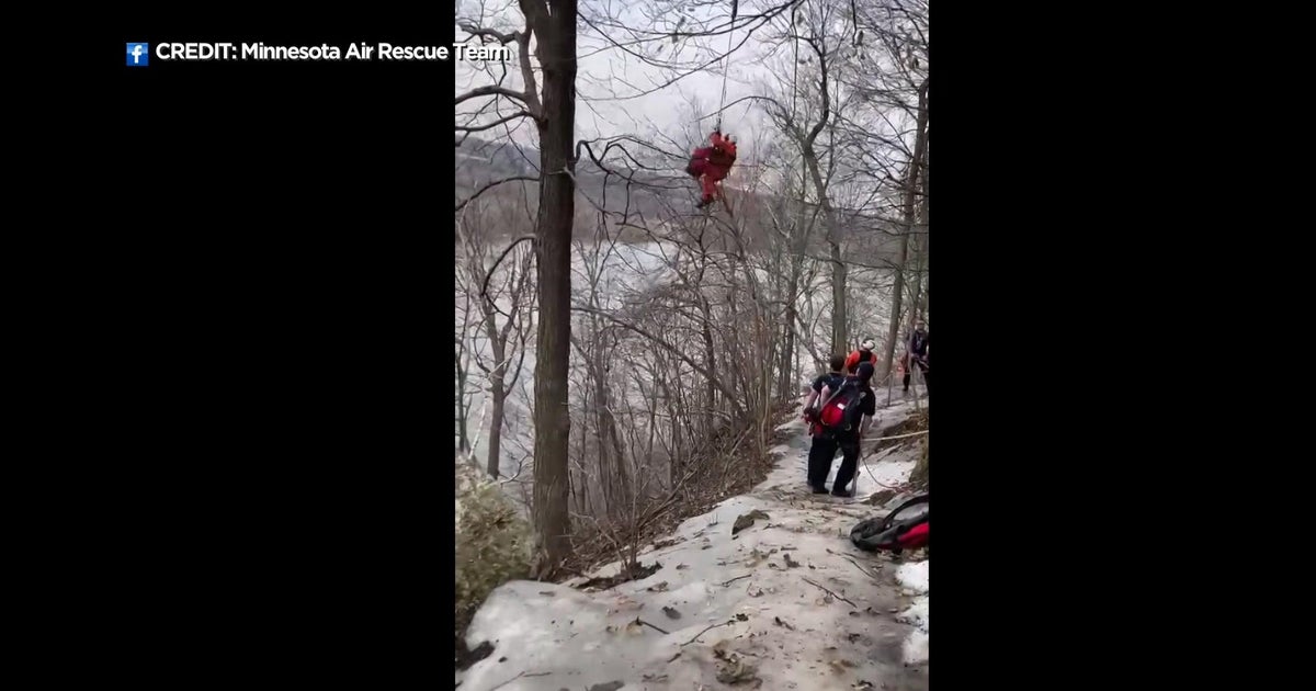 WATCH: Minnesota Air Rescue Team saves family stuck on bluff in Red ...