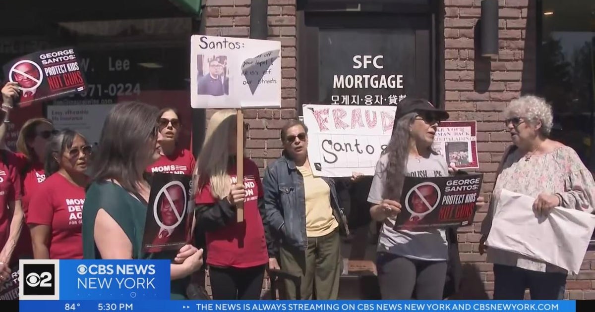 Demonstrators protest Rep. Santos' support for controversial gun bill ...