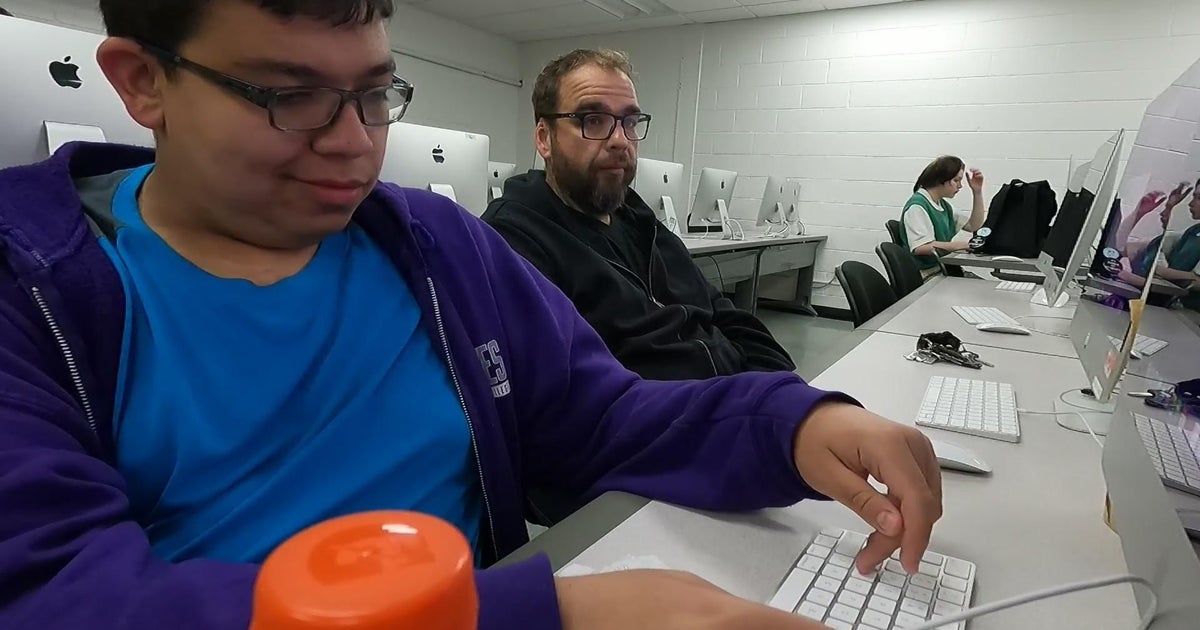 Young man with autism and his dad are a dynamic duo in art classes ...