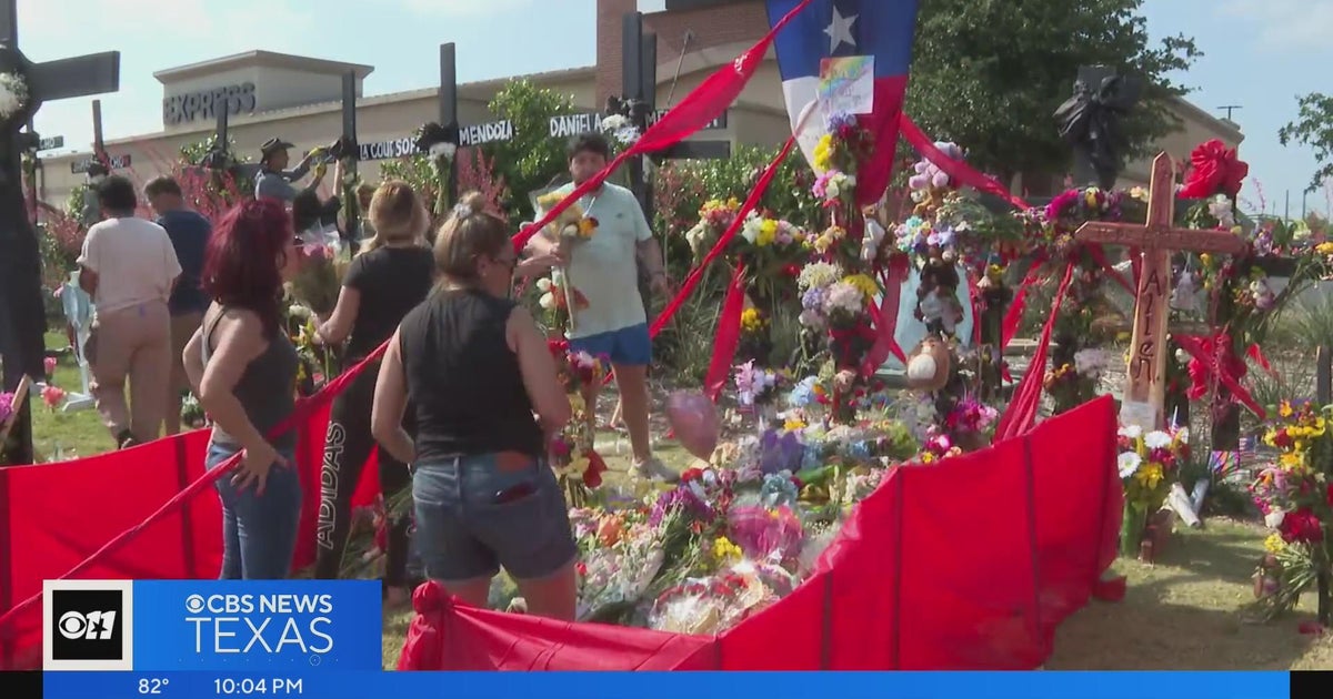 Memorials continue to grow at Allen outlet mall - CBS Texas