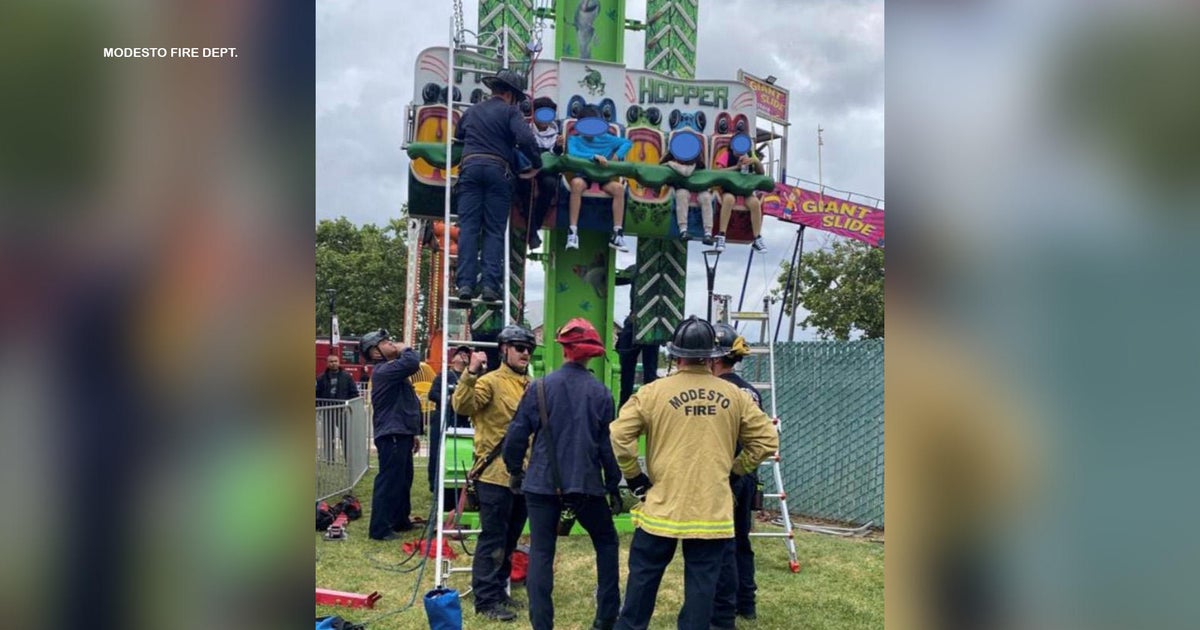 4 children rescued after ride gets stuck 10-feet off the ground at ...