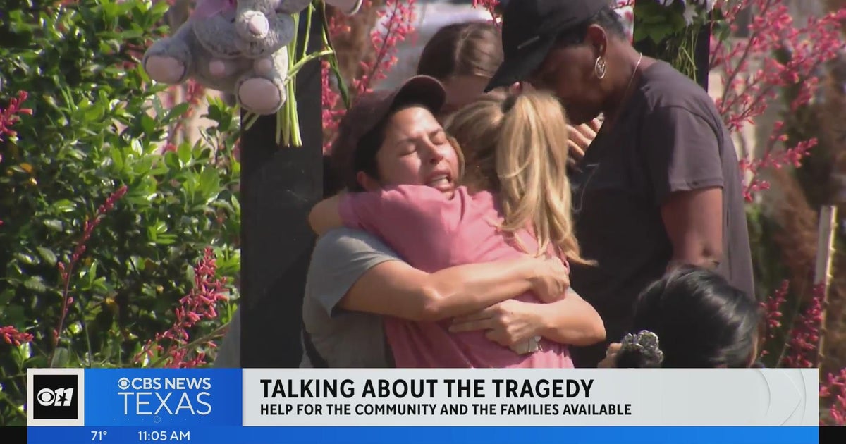 Community in mourning: More people visit growing memorial at Allen ...