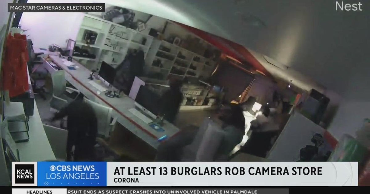 Security footage shows more than a dozen burglars swarming Corona ...