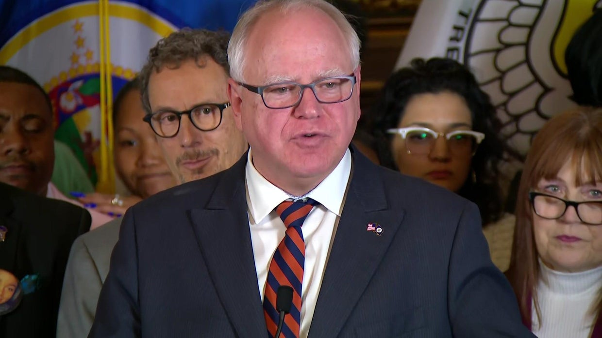 Walz signs public safety package with major gun control measures - CBS ...