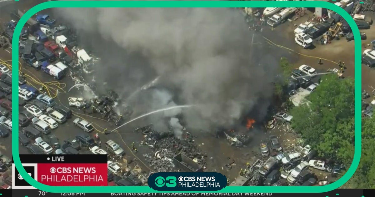 Health department investigating air quality in area of junkyard fire in ...