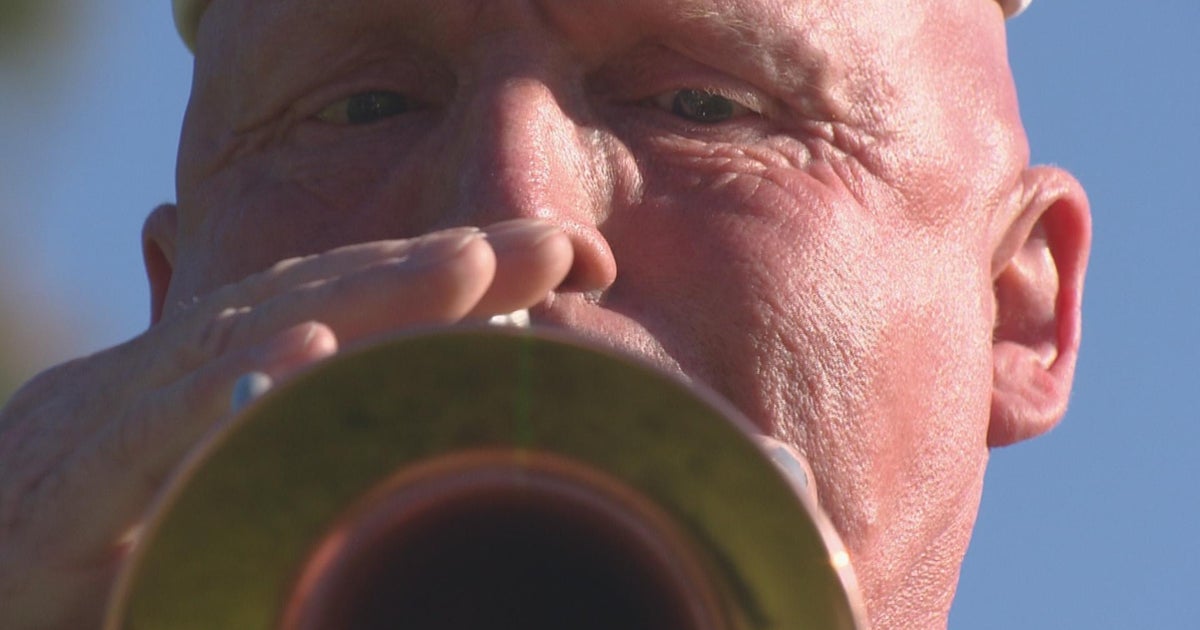 Trumpet player honors fallen servicemen and women at Fort Logan ...