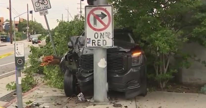 Driver abandons SUV smashed into Silver Lake street light pole - CBS ...