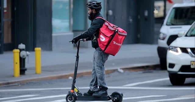 NYC more than doubling pay for food delivery workers - CBS News