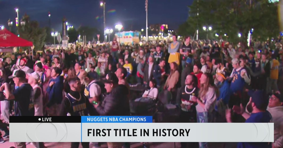 Nuggets fans celebrate outside Ball Arena - CBS Colorado