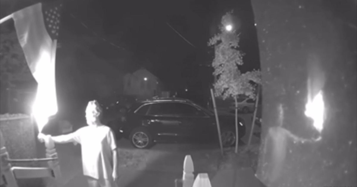 John Potts arrested after allegedly setting American flag on fire on ...