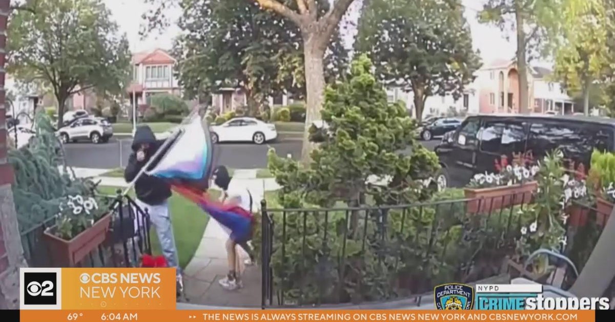 Suspects caught on video tearing down Pride flag - CBS New York