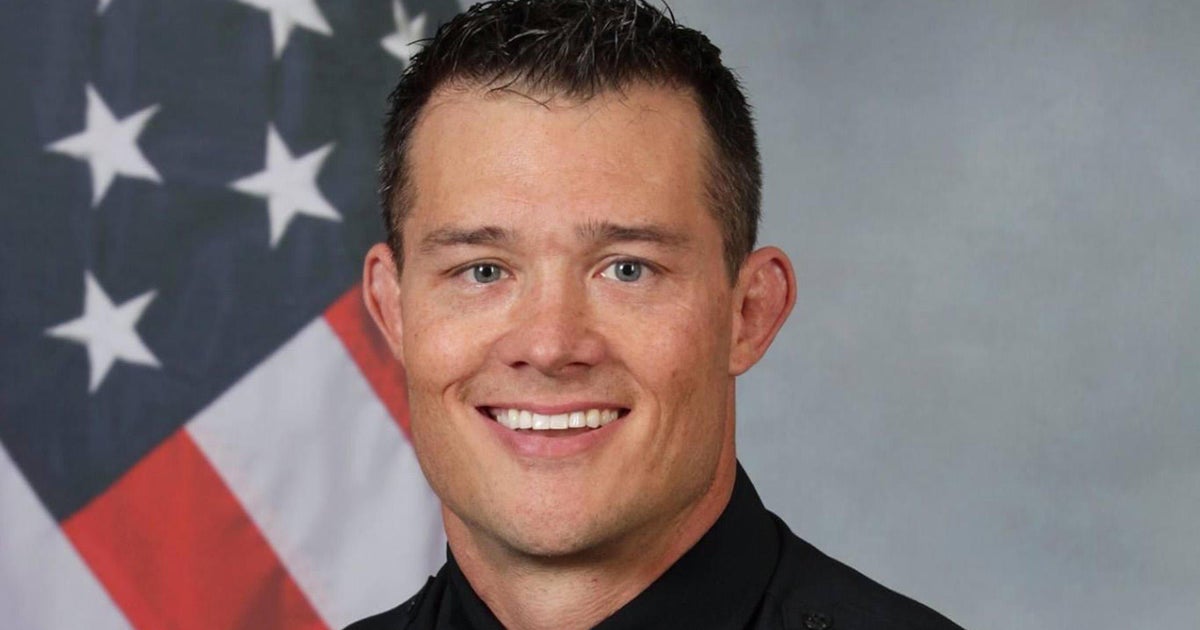 Doctors work to save leg of Denver officer Sgt. Justin Dodge hit by ...