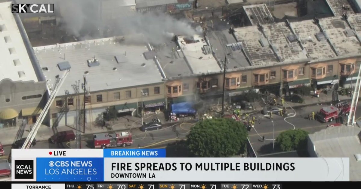 Greater alarm fire spreads to multiple buildings in downtown LA - CBS ...