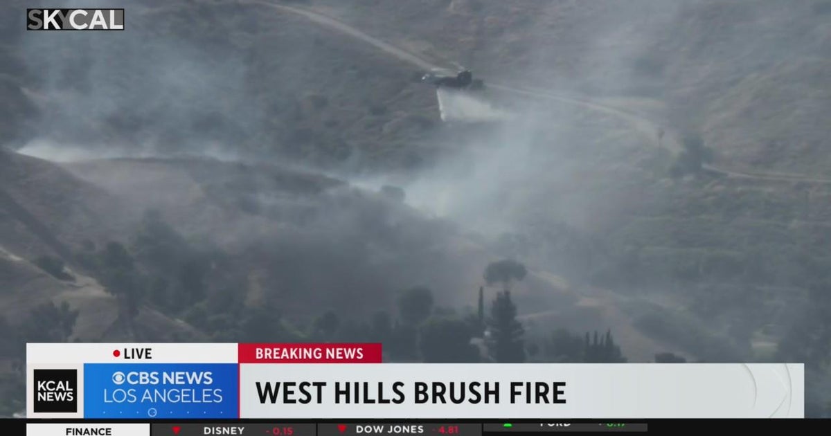Firefighters rush to extinguish brush fire near West Hills home - CBS ...