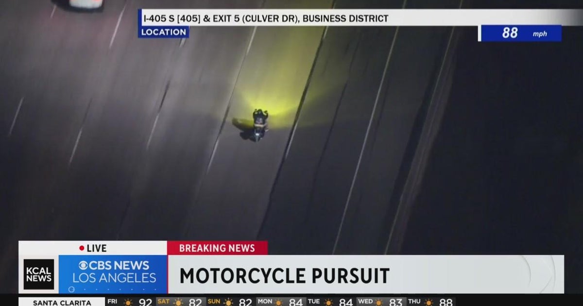 Motorcycle rider surrenders to police after leading chase through ...