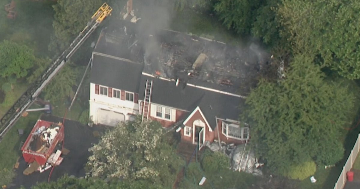 Roofers accidentally start fire at Milford home - CBS Boston