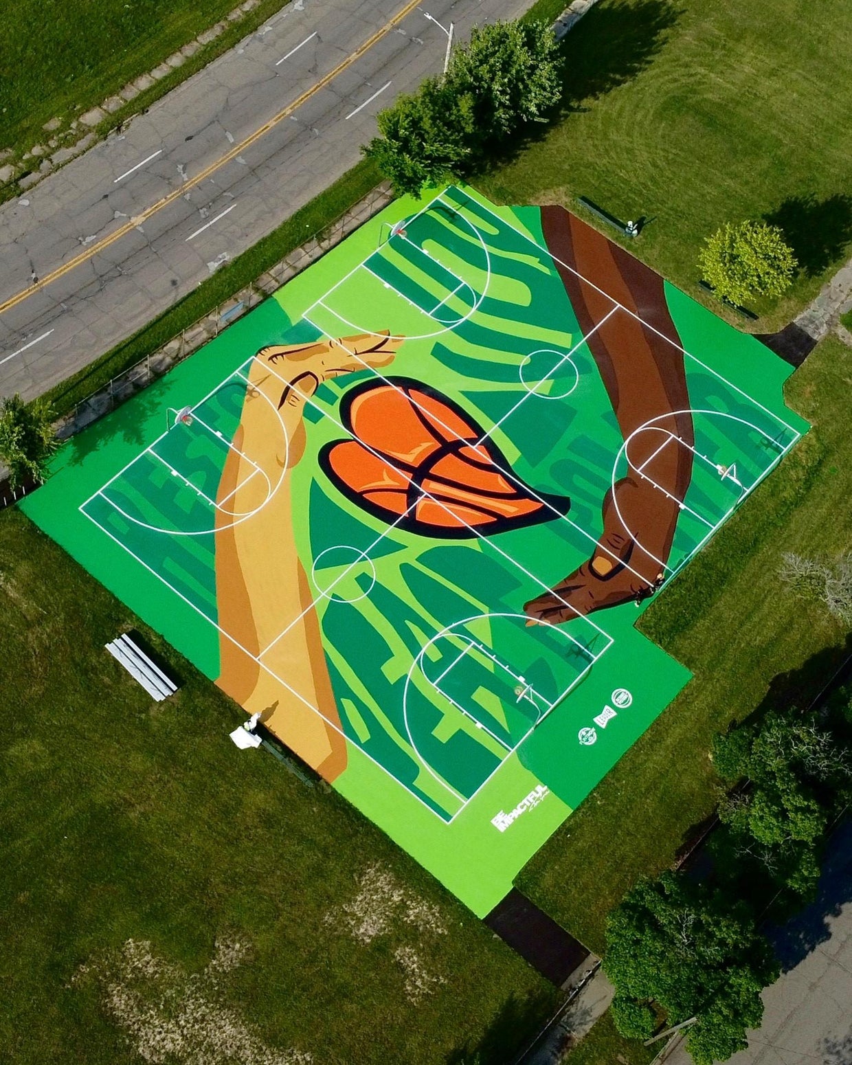 New Flint basketball court is a mural - CBS Detroit