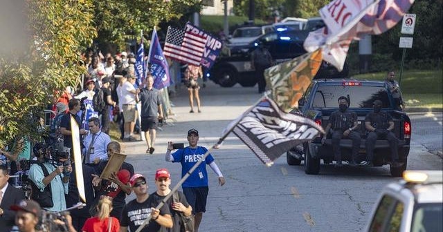 Protesters Gather Ahead Of Trumps Expected Surrender In Georgia Cbs News