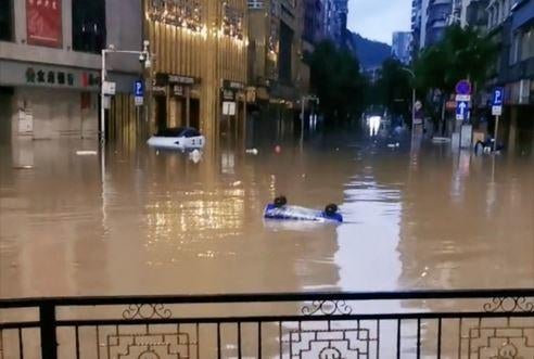 Floodwater sweeps away fire truck in China as Tropical Storm Haikui ...