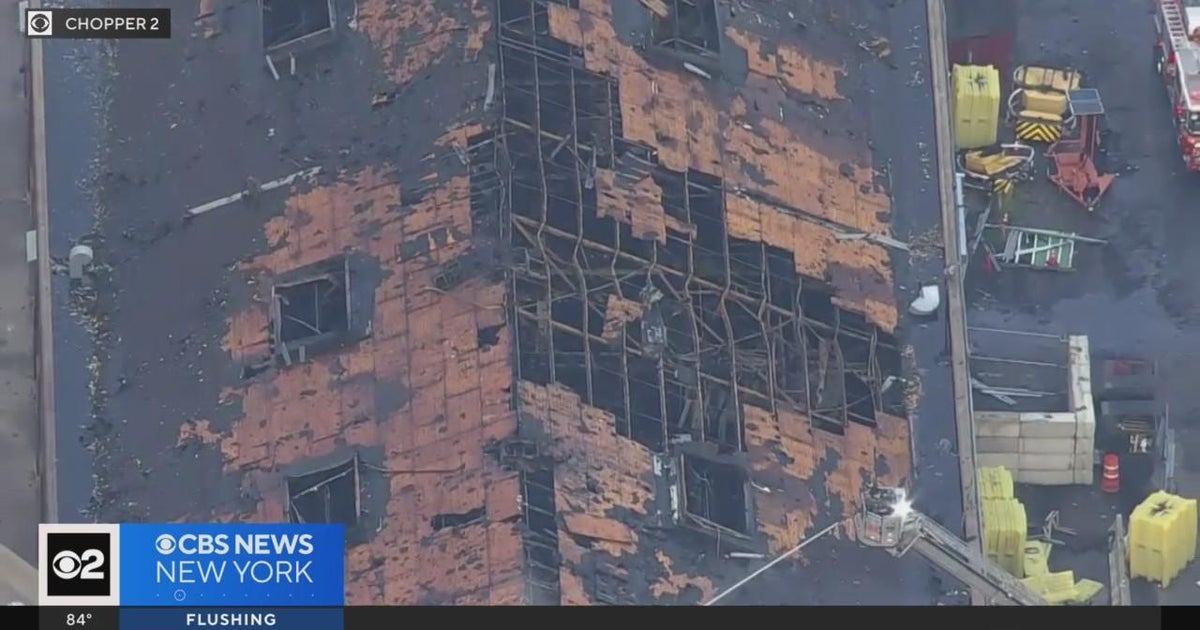 Massive fire under control at DOT warehouse - CBS New York