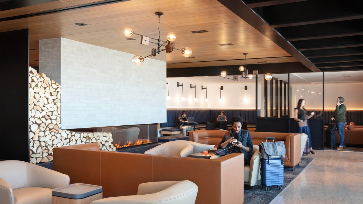 United Airlines opens new club at Denver International Airport - CBS ...