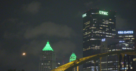 Downtown Pittsburgh buildings lit up in green in honor of Dr. Richard Moriarty, founder of Mr ...