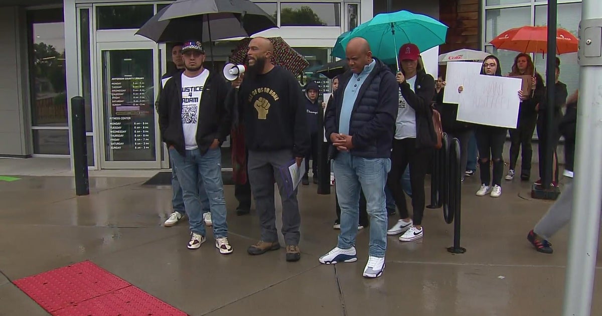 Family and friends of Adam Fresquez protest outside DA's office - CBS ...