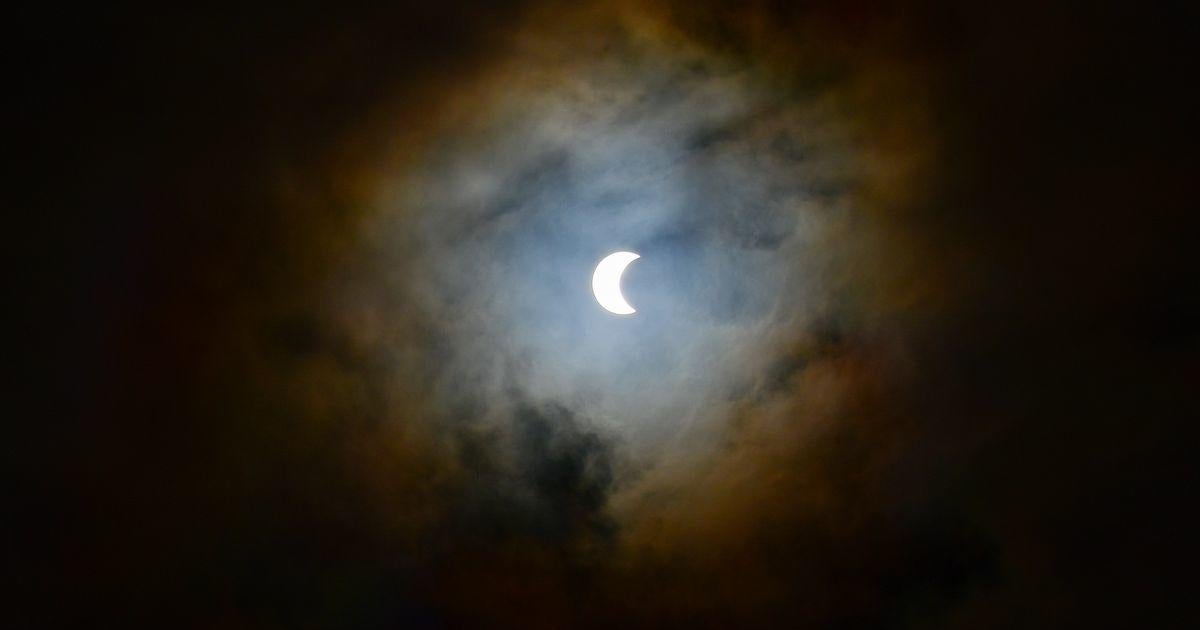 PHOTOS: Minnesota clouds clear just enough to see glimpses of solar eclipse - CBS Minnesota