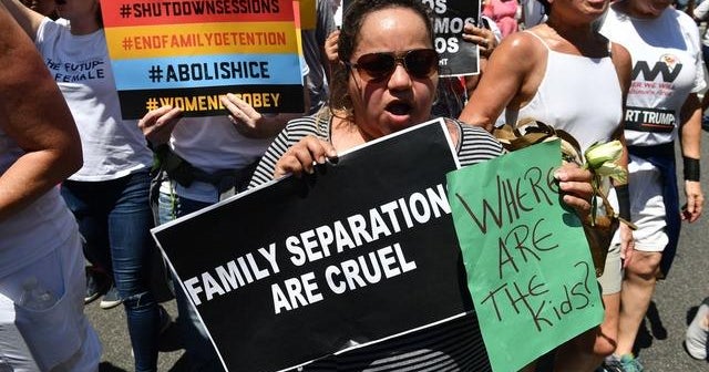 Families separated at border under Trump reach settlement - CBS News