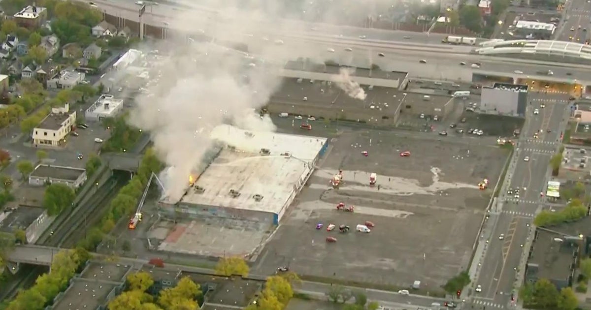 Investigators look into what sparked a big fire at the old Kmart on ...