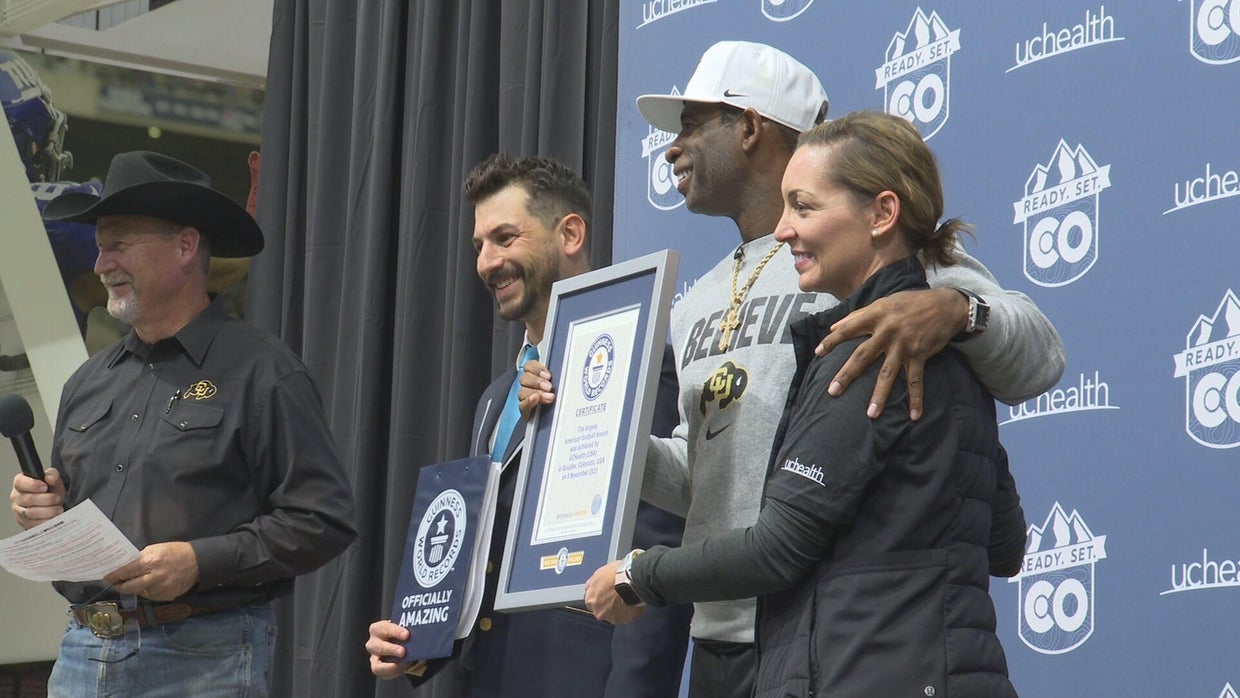 Deion Sanders sets Guinness World Record for largest American football ...